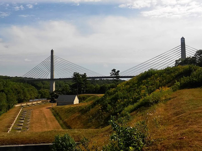 The bridge's twin towers rise dramatically from the landscape, visible for miles and serving as a landmark for travelers throughout the region.