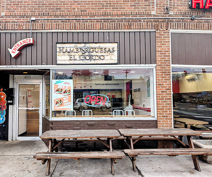Outdoor seating: Simple wooden picnic tables invite you to enjoy your Mexican-American feast al fresco—because some pleasures are best savored in the sunshine.