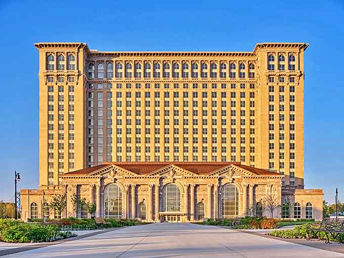 The grand architecture of Standish welcomes visitors with its impressive facade, standing tall against the bright blue Michigan sky.