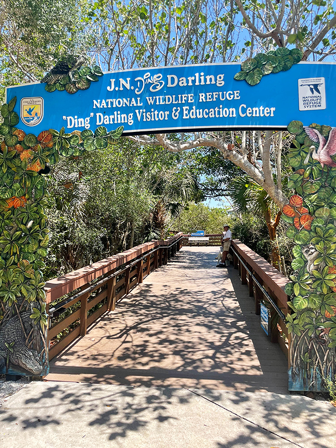 The welcoming entrance to J.N. "Ding" Darling National Wildlife Refuge, where Florida's wild side awaits just beyond the sign.