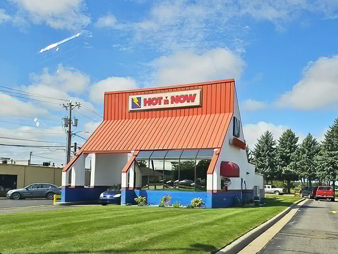 Classic drive-through design meets modern convenience in this perfectly preserved slice of fast-food history.