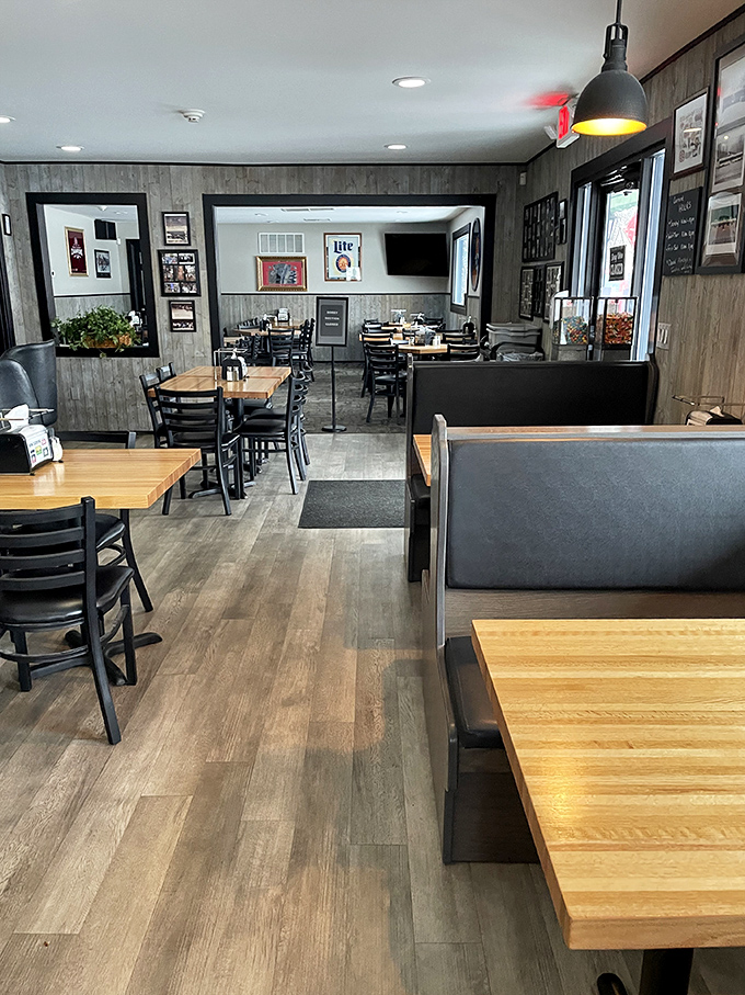 Simple wooden tables and comfortable seating create the perfect backdrop for family meals and memories in DiMaggio's renovated dining room.