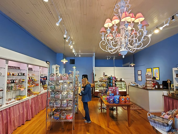 Step inside to discover a whimsical wonderland where elegant chandeliers hang above tempting display cases. Who knew heaven had blue walls and wooden floors?