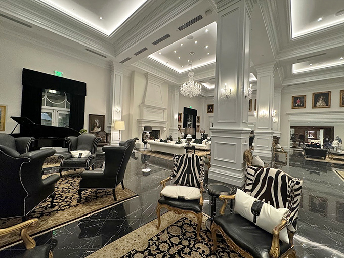 Elegance meets comfort in the lobby, where crystal chandeliers and zebra-print chairs create an atmosphere of sophisticated whimsy.