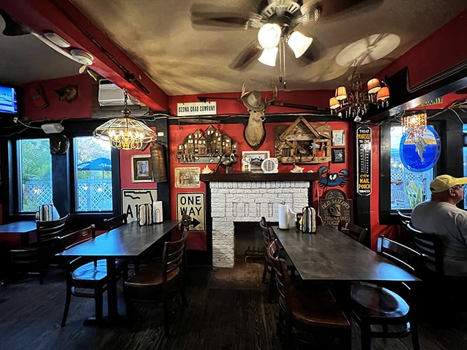 Step inside and discover a treasure trove of maritime memorabilia where every wall tells a story and that fireplace promises cozy dining even on rare chilly Florida evenings.