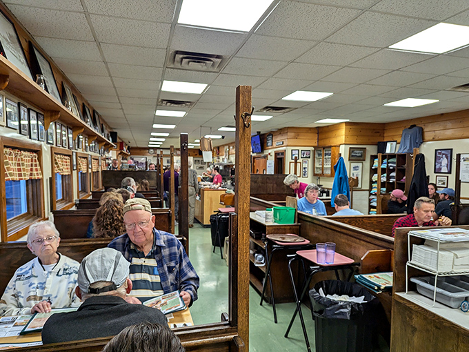 Church pew-style wooden booths line the walls, worn smooth by generations of diners who've made this Maine institution their second home.
