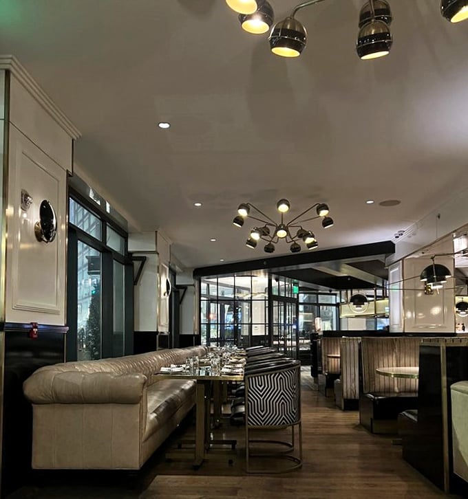 Cream leather banquettes and geometric chairs create a symphony of textures &ndash; comfort never looked so sophisticated.