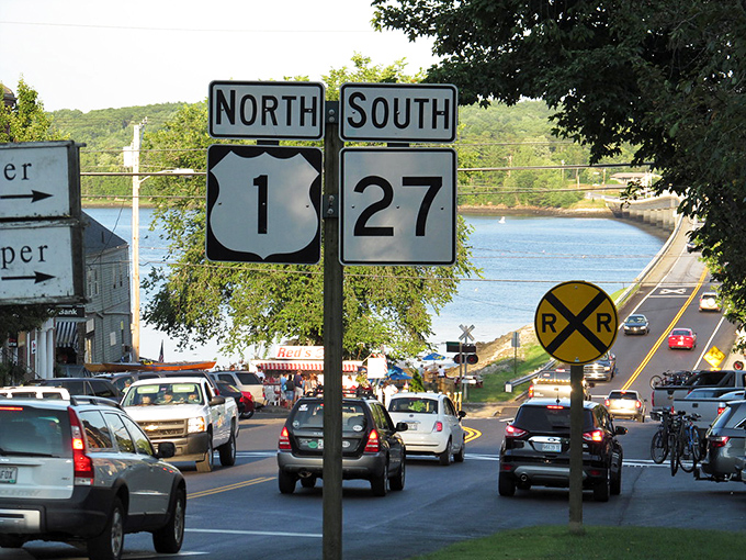 Route 27 winds through western Maine like a ribbon unwrapping a gift – each curve reveals another postcard-worthy scene.