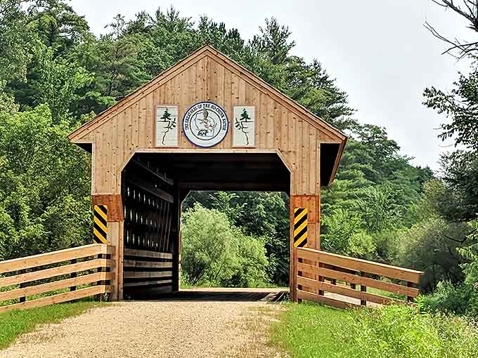 Entrance: This rustic covered bridge serves as a gateway to adventure, welcoming trekkers with its charming wooden architecture and promise of wilderness beyond.