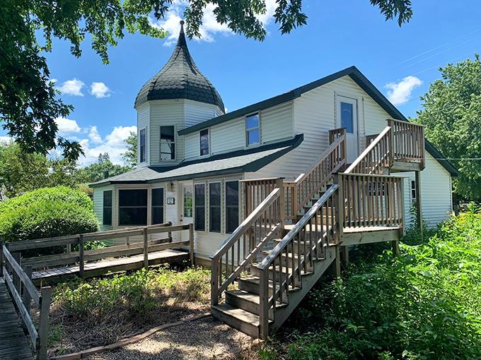 That distinctive onion dome isn't a quirky architectural choice but a faithful recreation of pioneer ingenuity and the Ingalls family's actual home.