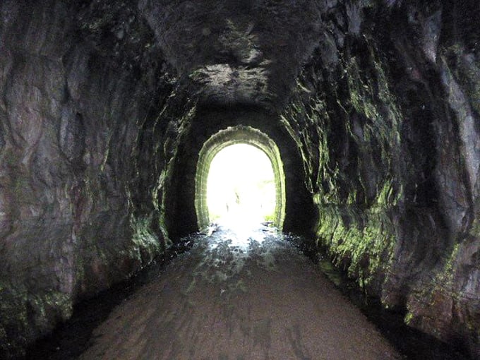 Light at tunnel's end creates a mesmerizing perspective &ndash; the curved walls forming a perfect frame for hope ahead.