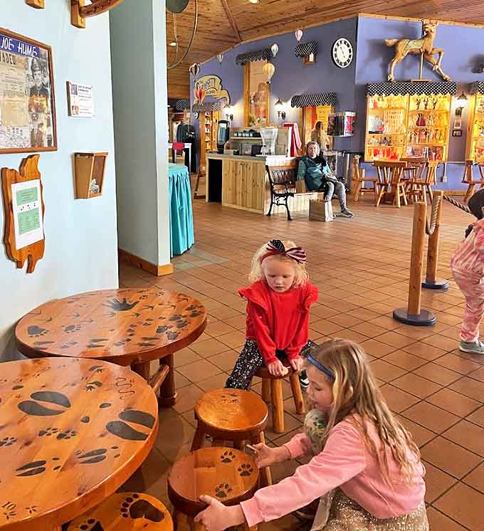 Young explorers discover the magic of hands-on play at tables specially designed for creating memories, not just merchandise.