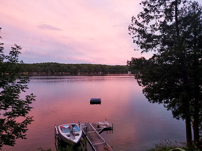 Sunset transforms this wooden dock into the perfect launching pad for dreams and quiet contemplation.