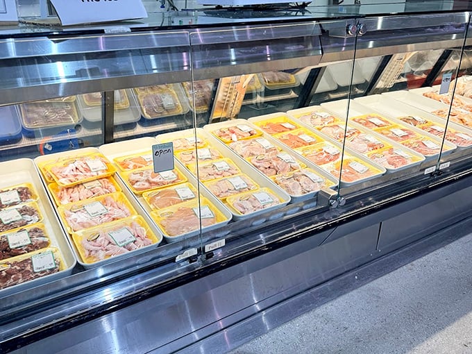 Behind gleaming glass, a rainbow of marinated delicacies and prepared meats offers shortcuts to authentic Asian flavors for busy home cooks.