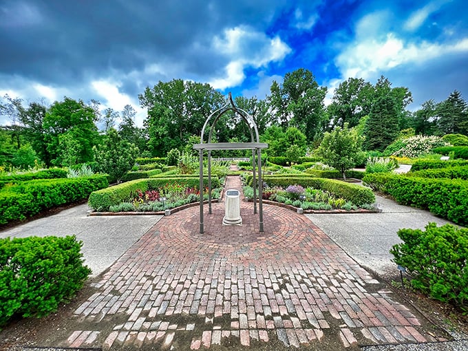 Step through this garden archway and enter a perfectly manicured world where geometric precision meets natural beauty in harmonious balance.