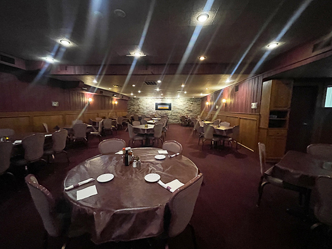 Step inside to a dining room where time slows down &ndash; wood paneling, stone accents, and tables set for memorable meals shared with loved ones.