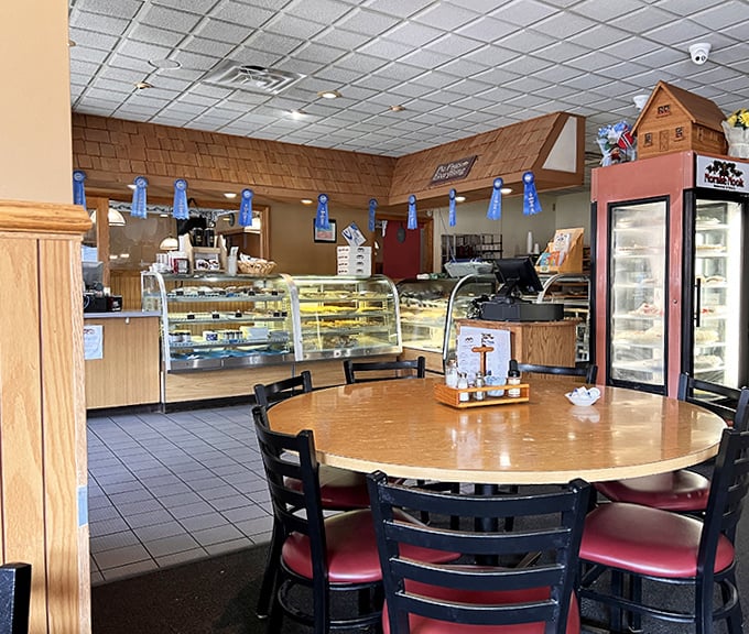 Inside Norske Nook, the bakery counter gleams with possibility&mdash;each glass case a window into a world where calories don't count and pie dreams come true.