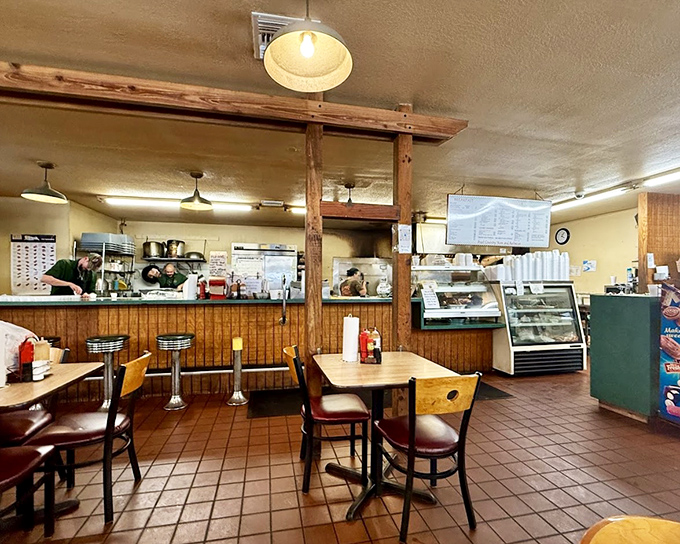 Wooden beams and simple furnishings create that "grandma's kitchen" vibe, where conversations flow as freely as the sweet tea.