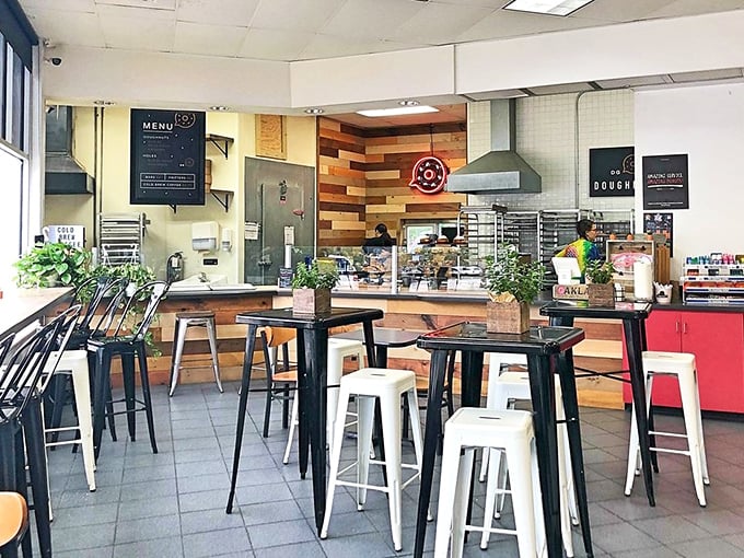 Inside, clean lines and warm wood tones create a space where hanging ferns meet your doughnut dreams in perfect harmony.
