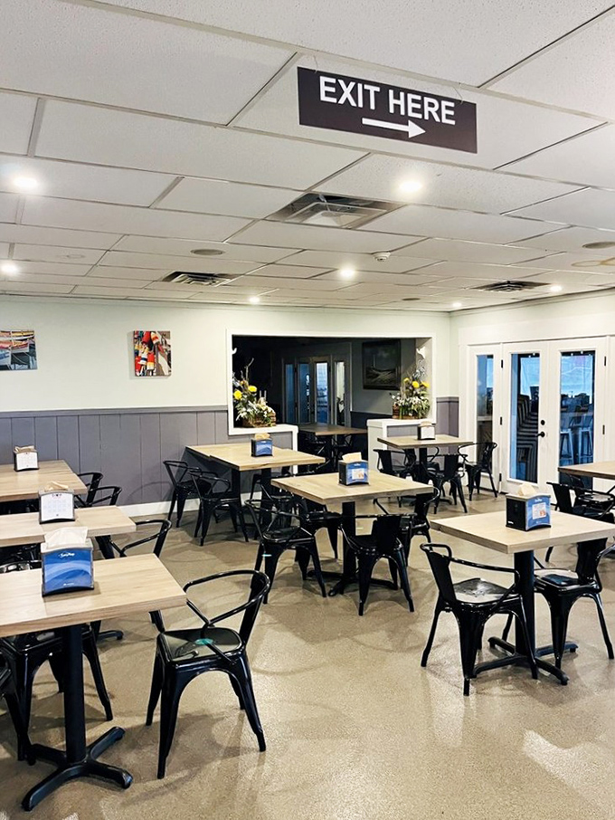 Clean, modern dining space where donut dreams come true, with simple tables perfect for focusing on what matters&mdash;the food.