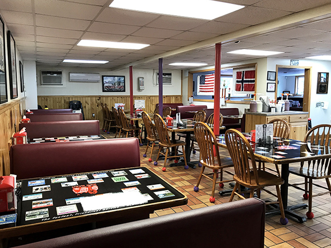 Wood-paneled warmth welcomes hungry visitors to this no-nonsense dining room where seafood stories are shared between bites.