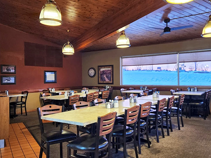 Warm wood paneling and cozy seating create the perfect backdrop for conversations that flow as freely as the coffee refills.