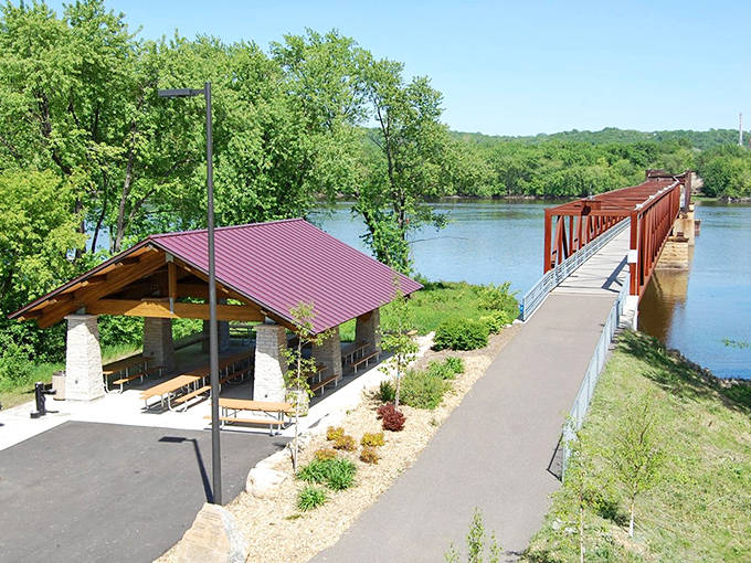 A bird's-eye perspective reveals the perfect marriage of pavilion and pathway, where history meets recreation at Swing Bridge Park.