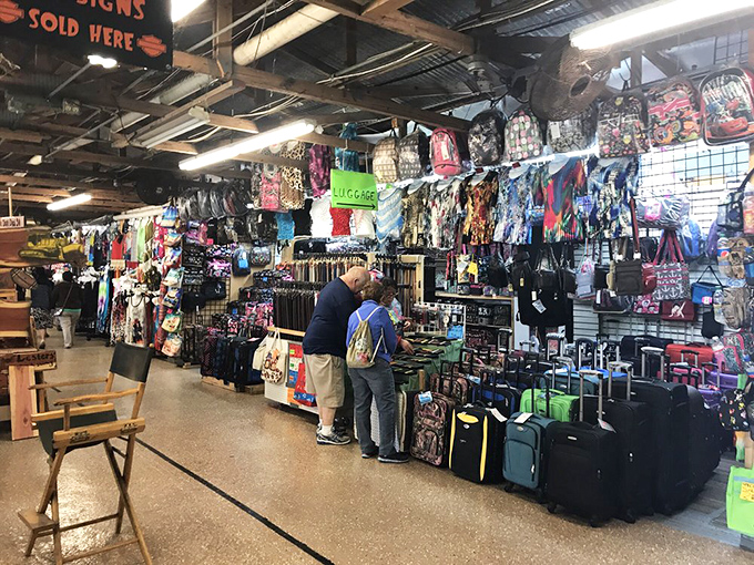 Bags, backpacks, and travel accessories galore! This vendor's colorful display could outfit a world traveler or someone just heading to the beach.