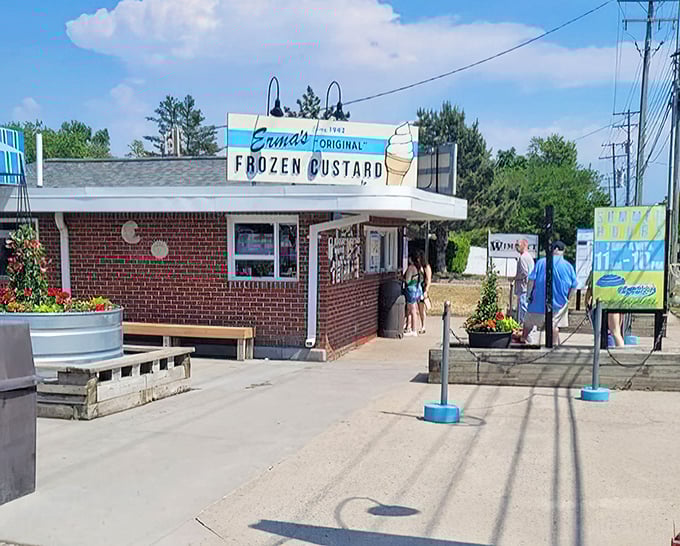 Erma's Original Frozen Custard's charming brick building welcomes custard lovers with its classic roadside stand appeal and promise of creamy delights.