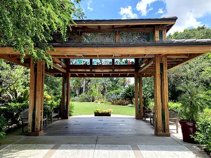 This peaceful garden gateway welcomes you into a tropical paradise where orchids and exotic plants create pure magic.