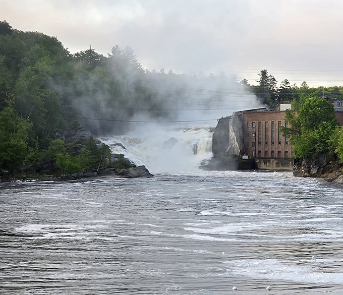 Rumford Falls thunders through downtown with industrial strength, its powerful cascade once the lifeblood of this Maine mill town.
