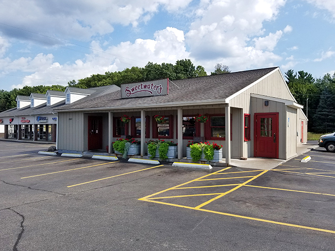 Sweetwater's charming exterior with its distinctive red trim has welcomed Michigan donut enthusiasts for generations.