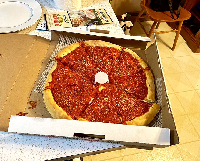 This Chicago-style deep dish masterpiece from Scotty's features a sea of rich tomato sauce atop a perfect cheese base, surrounded by that signature high-rising crust.