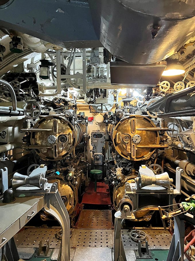 The torpedo room's intricate machinery shows how America's "Silent Service" packed deadly punch into limited space during underwater warfare.