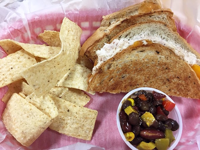 Not your average playground fare – this grilled tuna sandwich with house-made bean salad might make you forget you're dining in kiddie kingdom.