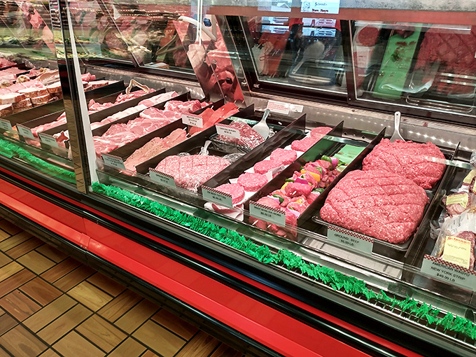 A rainbow of protein perfection awaits behind spotless glass, where steaks and chops are displayed like the culinary jewels they are.