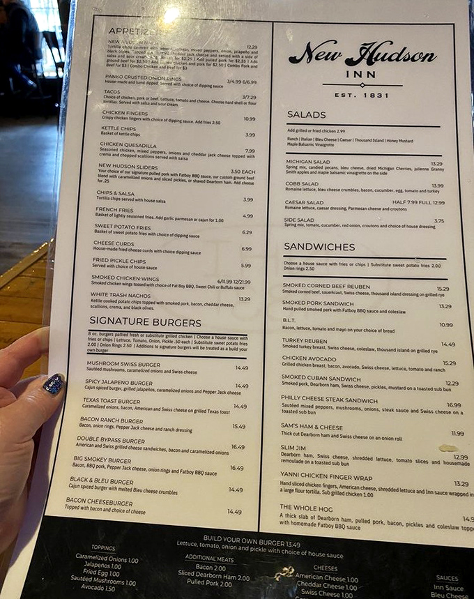 The menu reads like a love letter to burger enthusiasts, with options that'll have you planning your next visit before finishing your first bite.