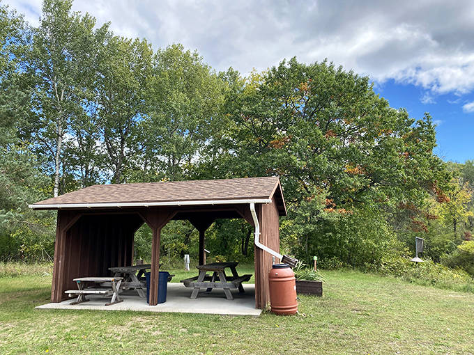 This cozy picnic shelter offers a perfect respite after trail adventures, where family stories unfold between bites of sandwiches and birdsong.