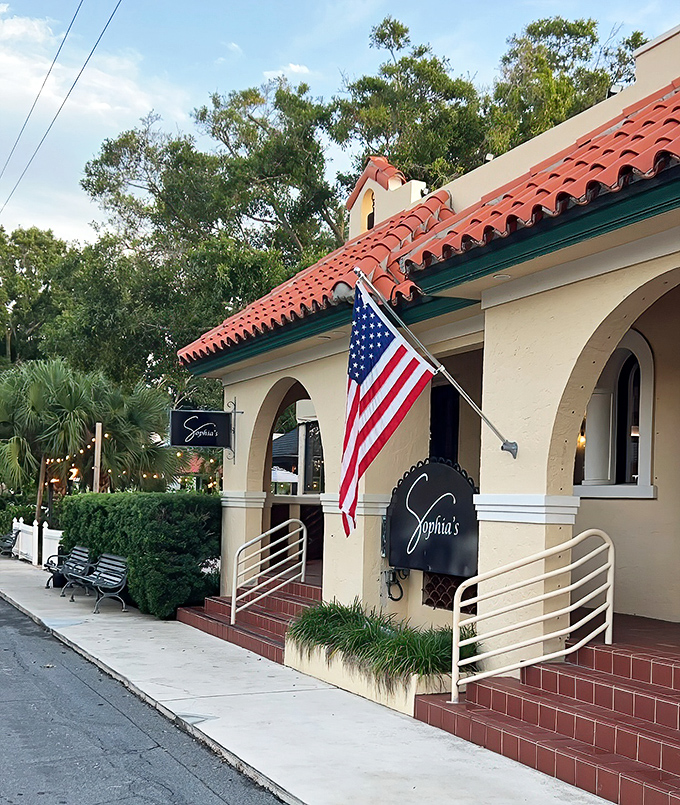 Sophia's stands as a culinary landmark with its Spanish-style architecture and American flag proudly waving &ndash; comfort food with a side of history.