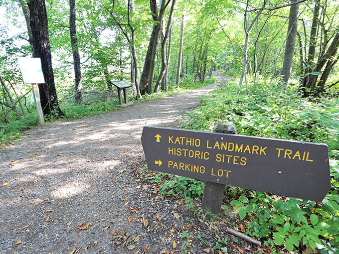 The Kathio Landmark Trail sign stands as a humble gatekeeper to 9,000 years of human history, pointing the way to adventures both physical and temporal.