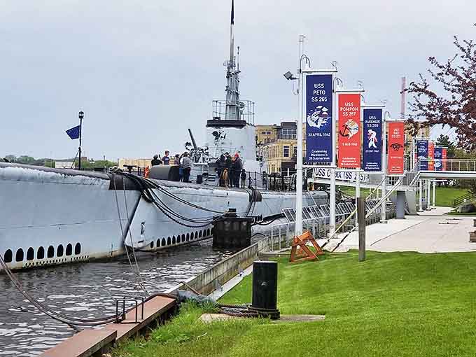 The USS Cobia sits docked and ready for visitors, her deck guns still pointed skyward after all these years of retirement from active duty.