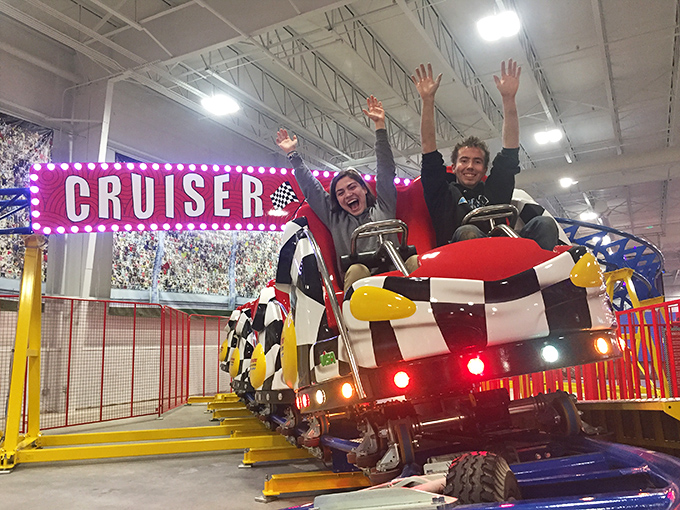 Cruiser coaster: Faces frozen in that perfect mix of terror and delight as riders experience the indoor coaster's thrilling drops and turns.