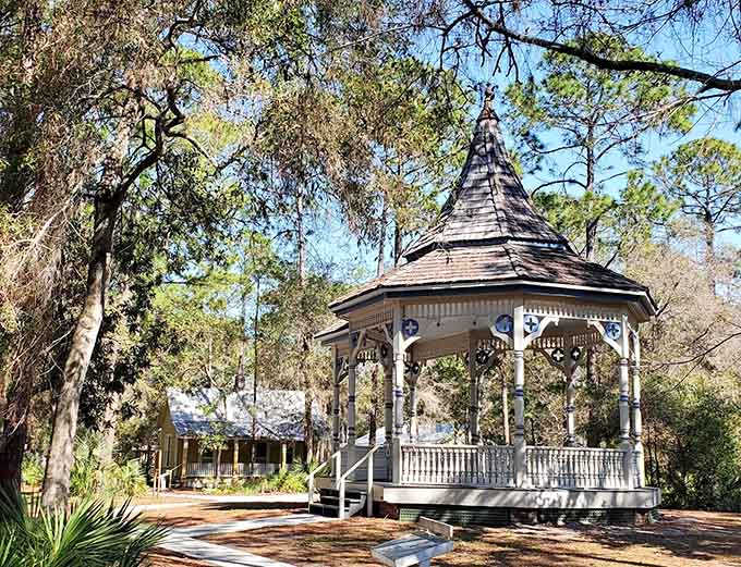 This gazebo has hosted more romantic moments than a Nicholas Sparks movie marathon, standing proud among the trees like it knows exactly how photogenic it is.