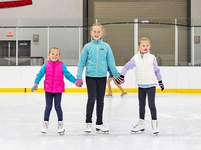 Young skaters glide hand-in-hand across pristine ice, creating memories that will last longer than Minnesota's winters.