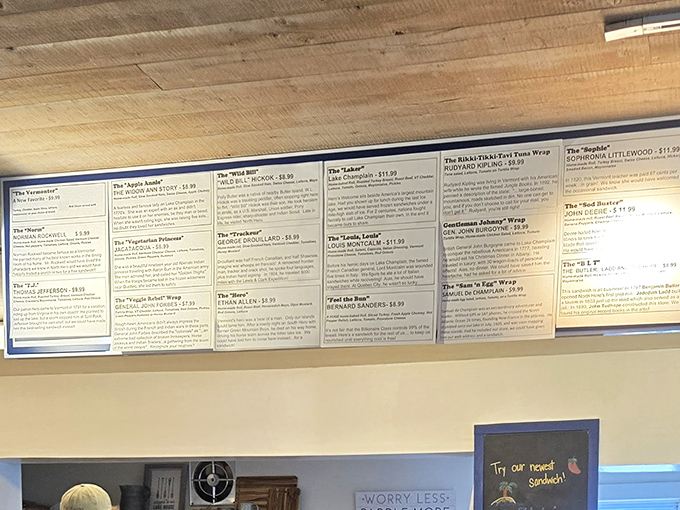 The extensive sandwich menu board showcases creative combinations with whimsical names that tell stories of local landmarks.