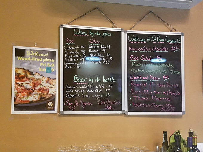 Wine by the glass and wood-fired pizza sharing menu space with chocolate, because someone finally figured out the perfect day looks like this.