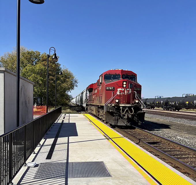 Power and grace in motion &ndash; a freight train thunders past, a reminder of Wisconsin's industrial backbone.
