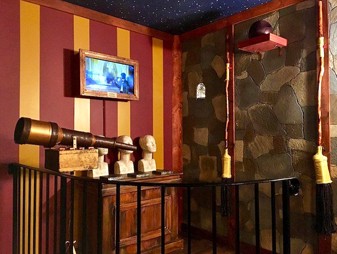 Red and gold striped walls frame this magical chamber where telescopes and mysterious artifacts await discovery by eager puzzle-solvers.