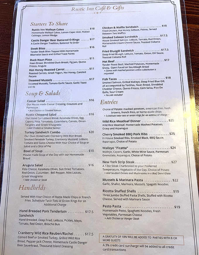 A menu that reads like a love letter to comfort food, featuring everything from Duck Naan Pizza to the legendary Wild Rice Meatloaf.