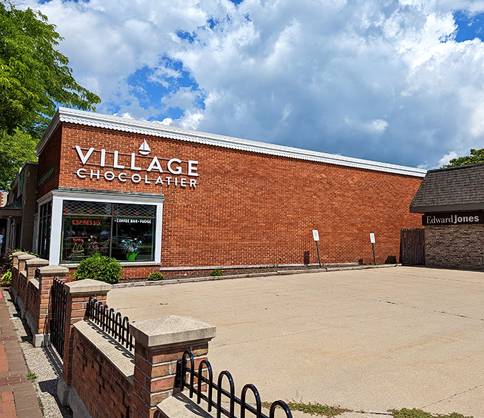 Village Chocolatier's brick building stands proudly in East Tawas &ndash; a chocolate beacon that's been drawing sweet-toothed pilgrims for decades.